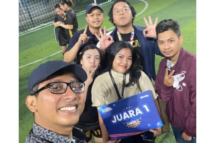 Tim Navi berhasil menjuarai E-Sport Mobile Legend KG Media 02 Festival ...
